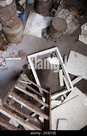 Top down view of a wooden ladder leading into a deep excavation site ...