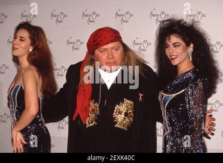 Sam Kinison, sister Sabrina Kinson and wife Malika Souiri (right ...