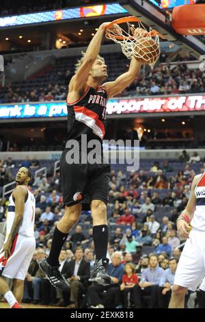 Portland Trail Blazers center Robin Lopez right, jockeys for rebound ...