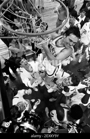 In this 1974 file photograph, NC State's David Thompson, Monte Towe, Mo ...
