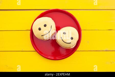 Doughnut with smiley face Stock Photo - Alamy