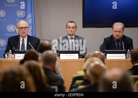 Forensic pathologist Dr. Stuart Hamilton, right, presents one of the ...