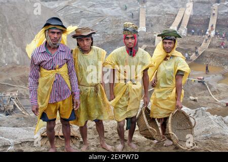 A group of poor miner's children in West Virginia hold the gifts they ...