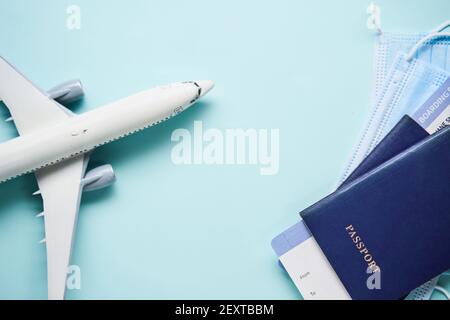 Plane mode, tickets and mask. Resuming flight travel concept due ...