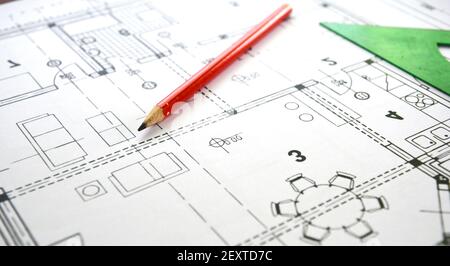Dream house planning with architecture plan, small model house, pen and ...