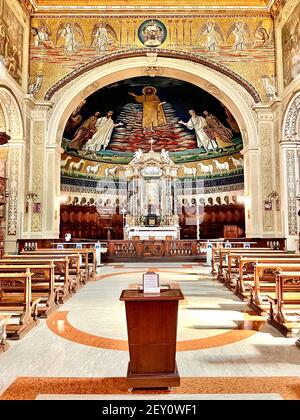 View of marble altar and old decorative frescoes inside historic ...