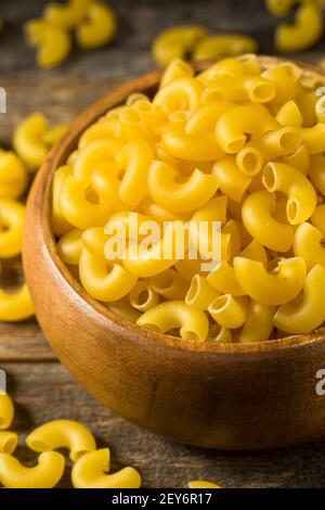 Food and Cuisine, Uncooked Elbow Macaroni or Gomiti Pasta in Wooden ...