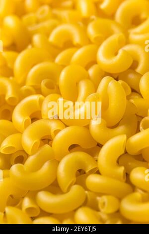 Food and Cuisine, Uncooked Elbow Macaroni or Gomiti Pasta in Wooden ...