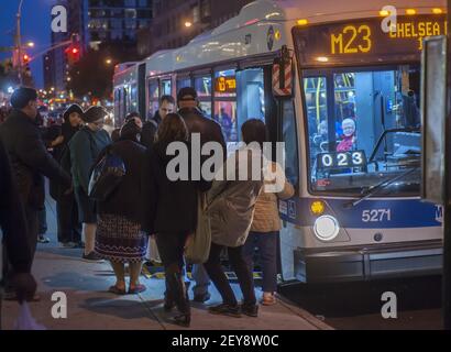 new york mta bus evening in Times Square New York City USA Stock Photo ...