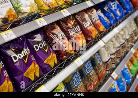 Lay's, Utz and Doritos chips on display in the section of the new ...