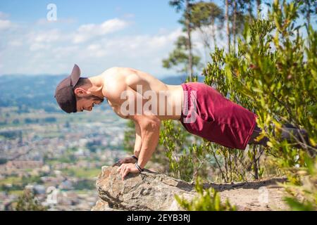 Sportsman doing push-up exercises in desert Stock Photo - Alamy