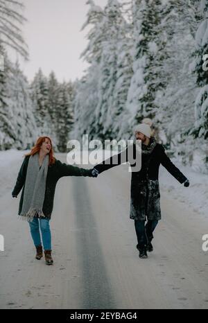 Beautiful loving couple hugging and walking in park on spring day Stock ...