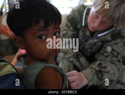 U.S. Navy Lt. Cmdr. Jennifer Forbus, left, the executive officer of the ...