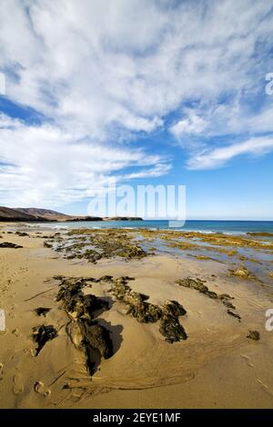 Water in lanzarote froth spain rock stone cloud musk and summer Stock ...