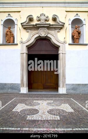 vanzaghello italy church varese the old door entrance and mosaic sunny ...