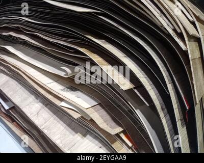 A pile of remnants of pieces of linoleum stacked on top of each other ...