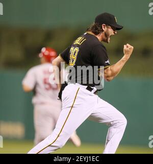 Pittsburgh Pirates closer Jason Grilli hugs first baseman Gaby Sanchez ...