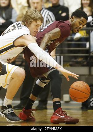 North Carolina Central's Jeremy Ingram (14) drives around Iowa State's ...