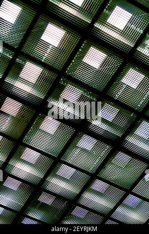The interior geometric pattern of building lamp fixture in lobby Stock ...