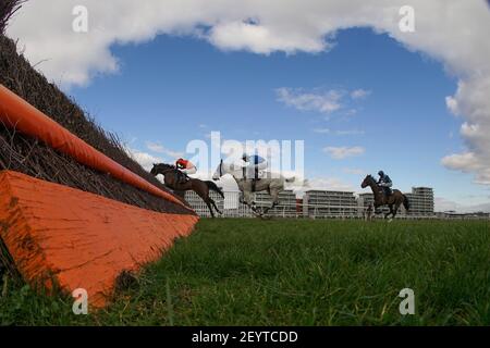 Lorcan Murtagh riding Sir Ivan (R, orange) on their way to winning The ...