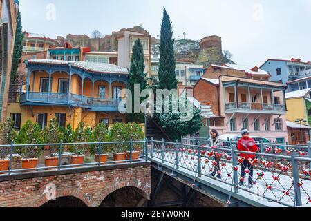 Tbilisi, Georgia - 24 February, 2021: Old Tbilisis with covered snow ...