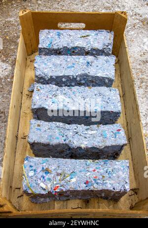 recycled paper fire logs Stock Photo - Alamy