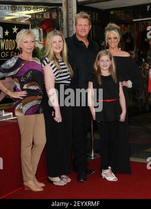 Gary LeVox with wife Tara and their children Rascal Flatts honored with ...
