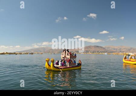 Indigenous Uru people on their handcrafted Totora reed boat on Lake ...