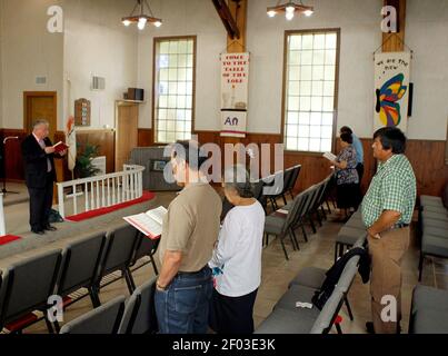 At Clanton Chapel United Methodist Church, Pastor Kirby Verret conducts ...