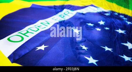 Brazilian money called Real and flag of Brazil image concept Stock ...