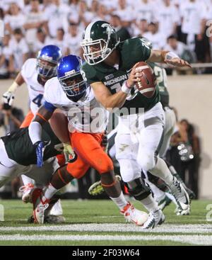 Michigan State quarterback Andrew Maxwell (10) is shown under center ...