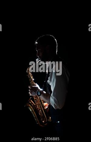 Alto Saxophone, side view Stock Photo - Alamy
