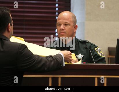 Jason Forgey, a canine handler for the Orange County Sheriff's ...