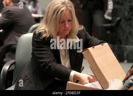 State attorney Linda Drane Burdick, center, arrives at the Orange ...