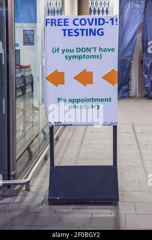 Free COVID-19 testing signs are displayed outside of COVID-19 testing ...