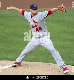 St. Louis Cardinals' Kyle McClellan sits in the dugout after giving up ...