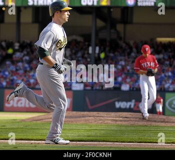 Oakland Athletics' Scott Sizemore rounds third after hitting a solo ...