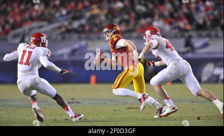 Iowa State quarterback Steele Jantz (2) scrambles for yardage ahead of ...