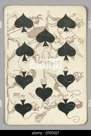 A vintage ten of spades playing card isolated on a black background ...