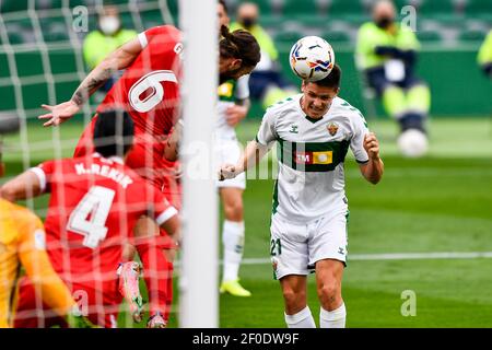 ELX, SPAIN - MARCH 6: Guido Carrillo of Elche CF and Nemanja Gudelj of ...