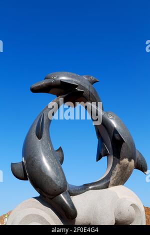 In oman old statue of dolphin Stock Photo - Alamy