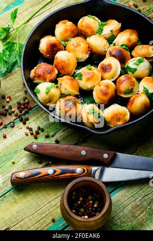 Frying pan with roasted tasty pelmeni.Fried dumplings Stock Photo - Alamy