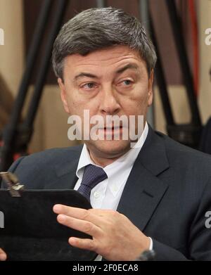 Samara, Russia - October 28, 2020: Different air compressors hanged on the wall of a building ...