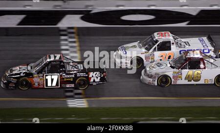 NASCAR Truck Series driver Dennis Setzer stands with his new ride, the ...
