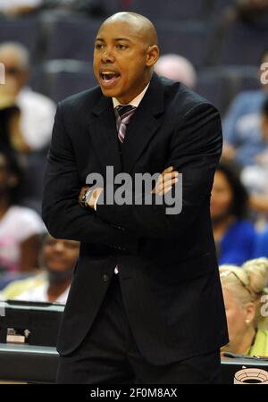 Phoenix Mercury head coach Corey Gaines, left, argues with referee Tom ...