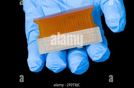 Orange printed circuit board with flex ribbon cables, small electronic ...