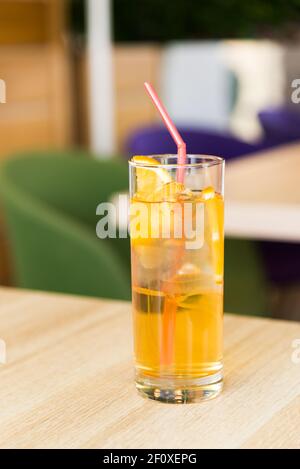 Glass of tasty lemonade on color background Stock Photo - Alamy