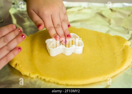 child makes dough cookie cutters Stock Photo - Alamy
