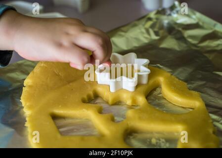 child makes dough cookie cutters Stock Photo - Alamy