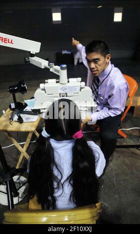 13 August 2009- Inglewood, California- Dr. Shasa Dabner exams deaf ...